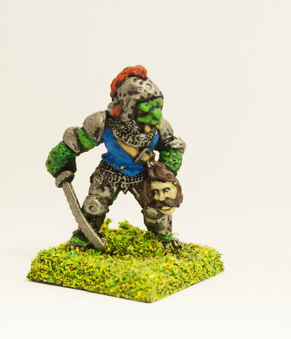 FAN34 Scaley Orc: Executioner with head of victim | Essex Miniatures